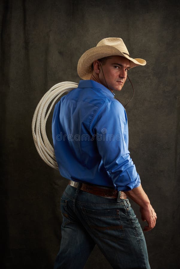 The Man Poses for the Camera Stock Photo - Image of cowboy, alluring ...