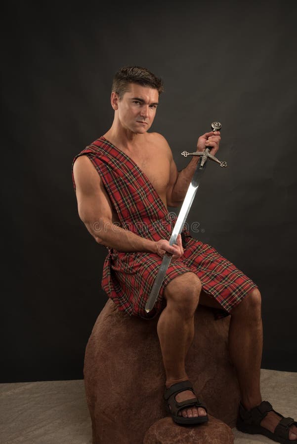 The Man Poses for the Camera Stock Photo - Image of highlander, dapper ...