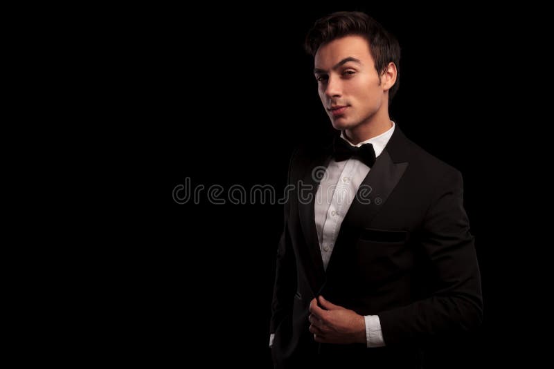 Man in Tuxedo Fixing His Collar Stock Photo - Image of attractive ...