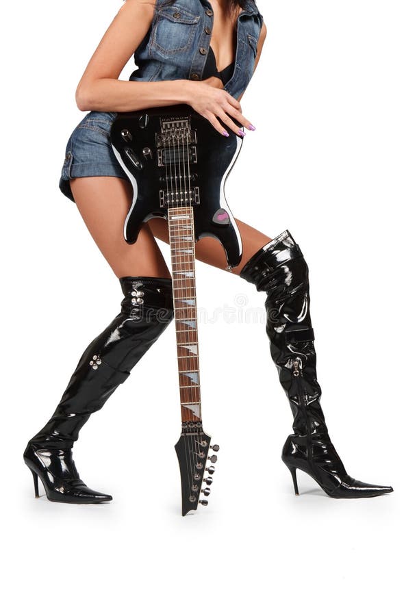 Pair Of Legs In Boots With Electric Guitar Stock Image Image 13298261