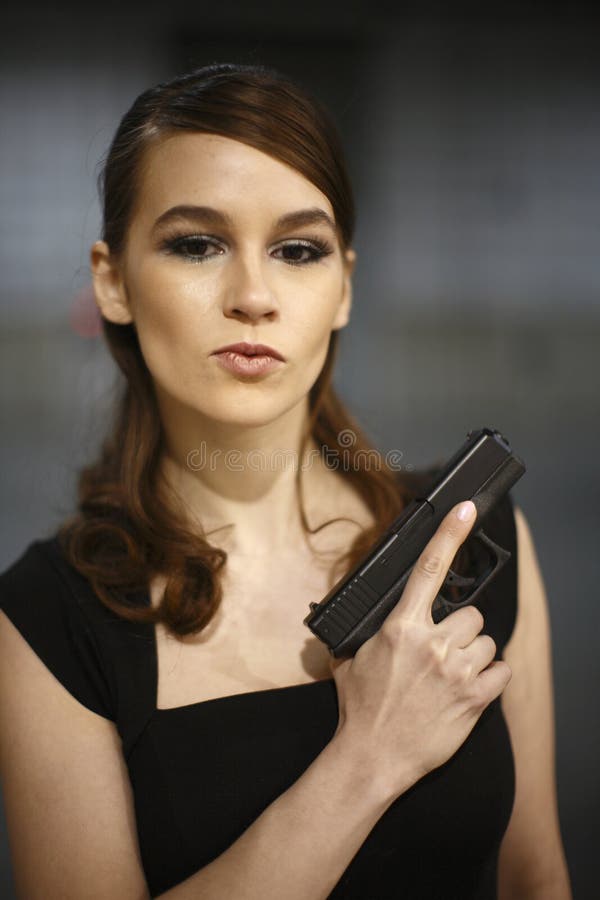 Woman Holding Gun stock photo. Image of black, ethnicity - 14936924