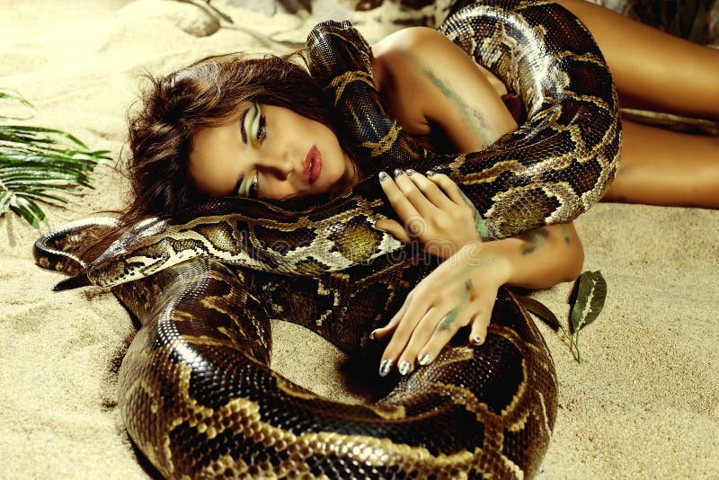 Woman with a Snake on the Beach Stock Image - Image of makeup, poison: 49863009