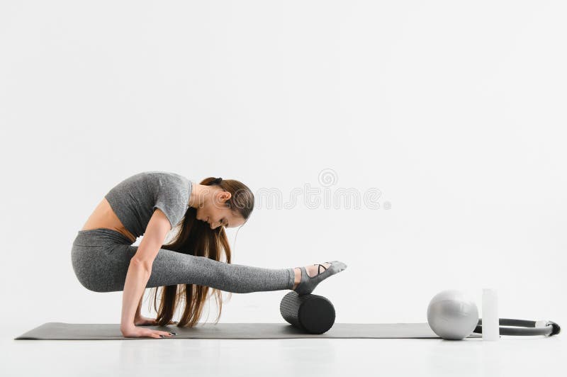 Young Female Doing Exercise on Isolated White Background Stock Photo ...