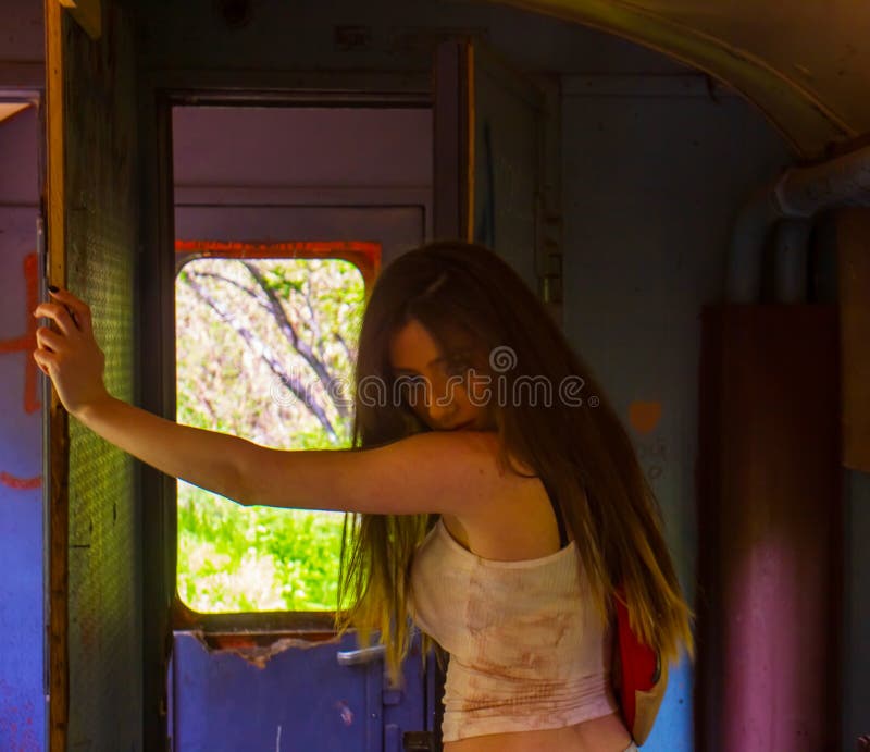 Young Woman Standing Near the Window Stock Photo - Image of black ...