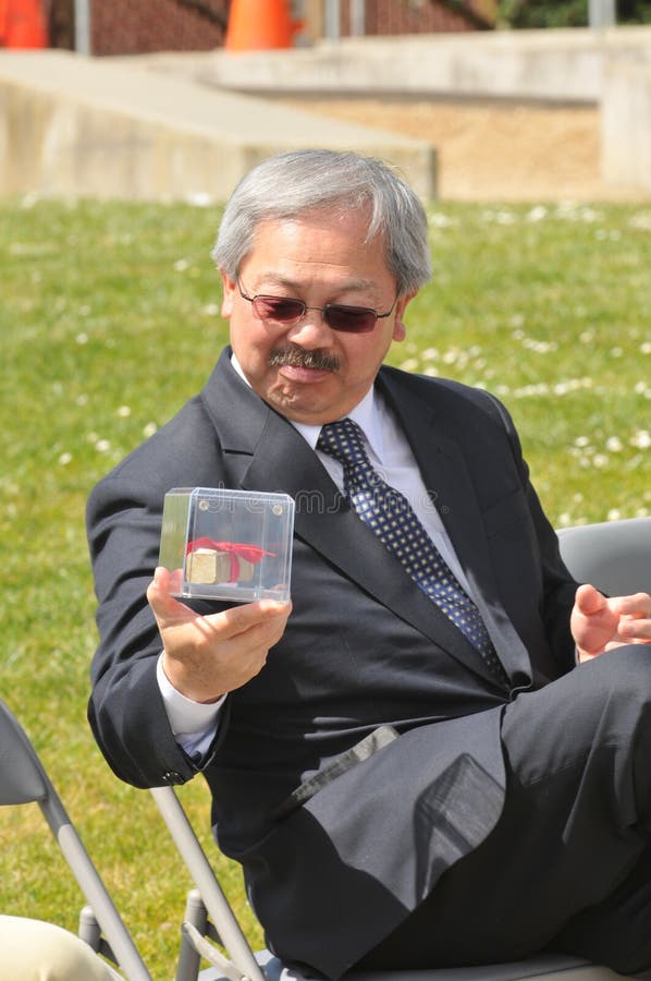 SF Mayor Ed Lee Looks at a Piece of Rebar. Editorial Photography ...