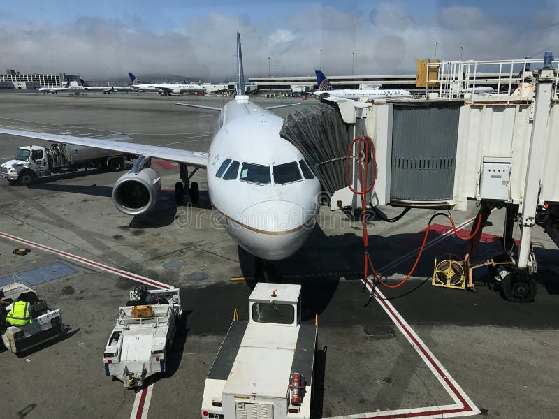 SFO Airport Runway, Jet with Jetbridge Loading for Flight Editorial ...