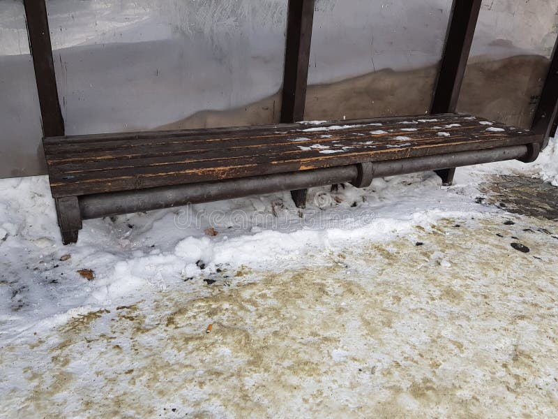 Shabby Old Bench at the Bus Stop in Winter Stock Photo - Image of ...