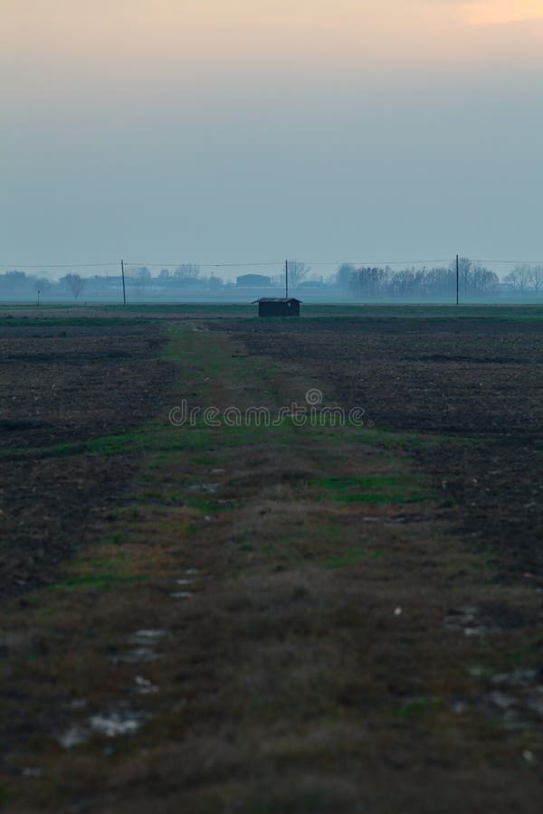 A Shack in a Ploughed Field at Sunset in Autumn Stock Photo - Image of ...