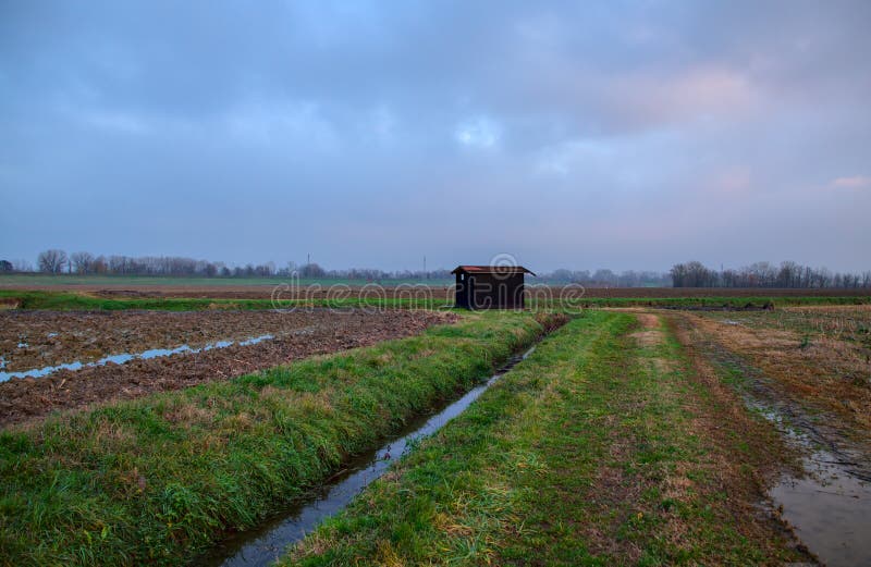 A Shack in a Ploughed Field at Sunset in Autumn Stock Image - Image of ...