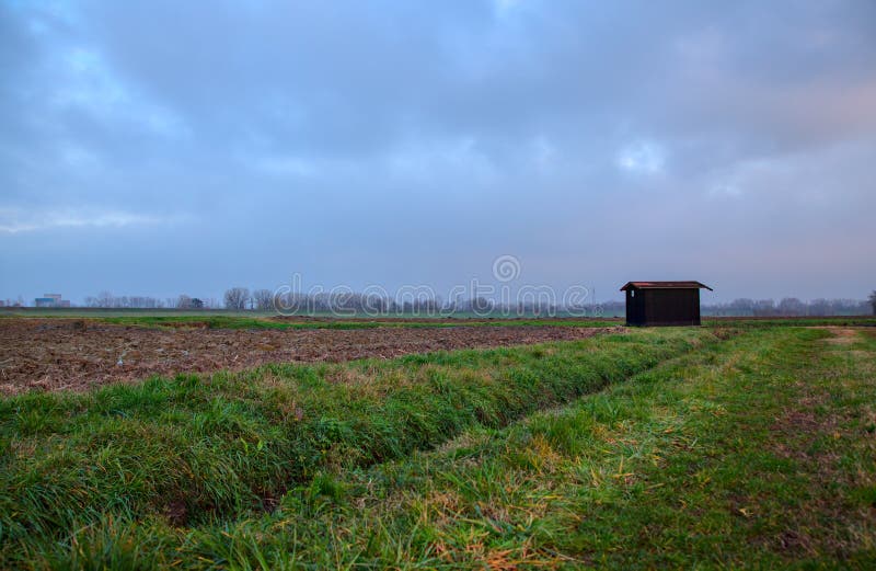 A Shack in a Ploughed Field at Sunset in Autumn Stock Image - Image of ...