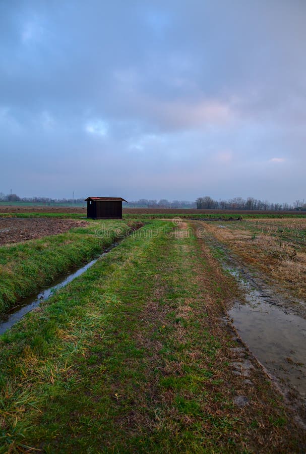 A Shack in a Ploughed Field at Sunset in Autumn Stock Image - Image of ...