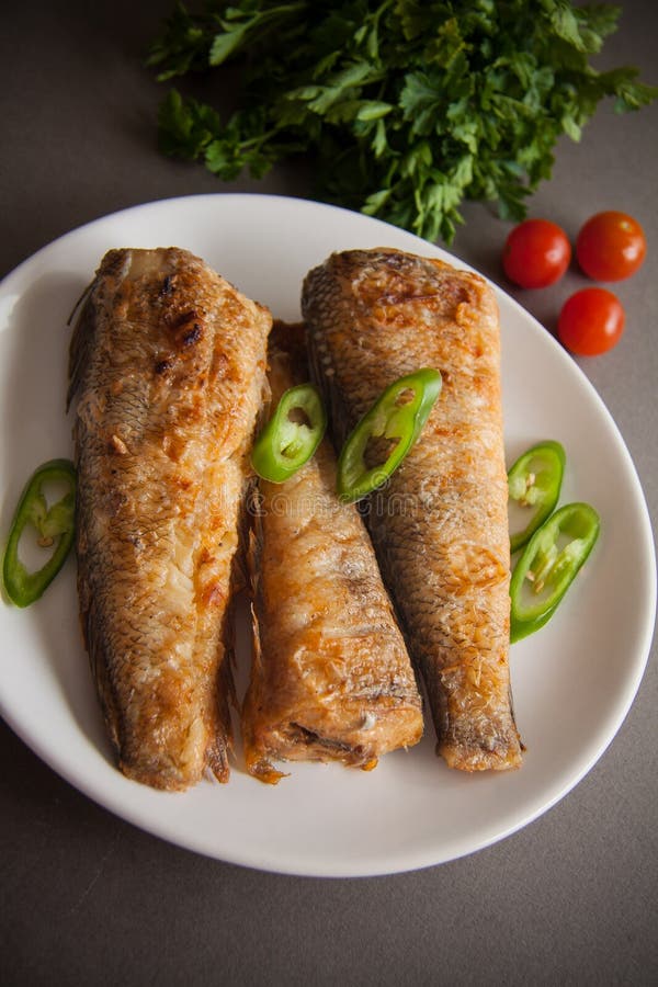 Shad with Tomato and Chilli Stock Photo - Image of vegetable, white ...
