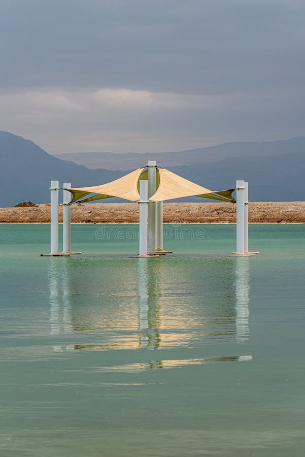 Shade Structure at the Beach of the Dead Sea Stock Photo - Image of ...