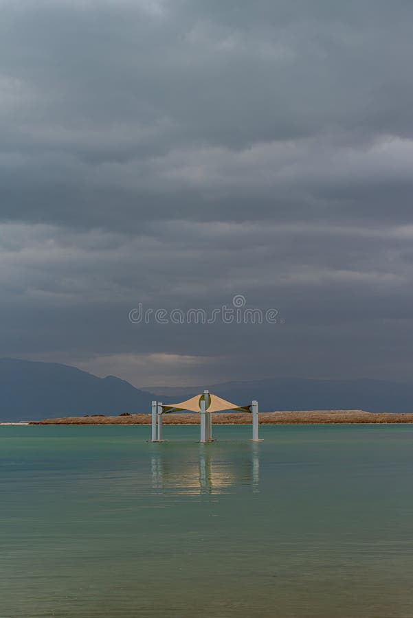Shade Structure at the Beach of the Dead Sea Stock Photo - Image of ...