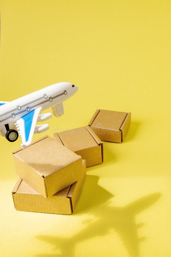 Shadow Airplane and Stack of Cardboard Boxes. Concept of Air Cargo and ...