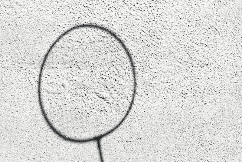 Shadow of a Badminton Racket Against a White Wall. Sport Concept Stock ...