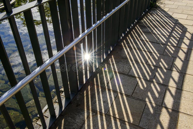 The Shadow of the Balcony Railing in Sunlight Stripes Stock Photo ...