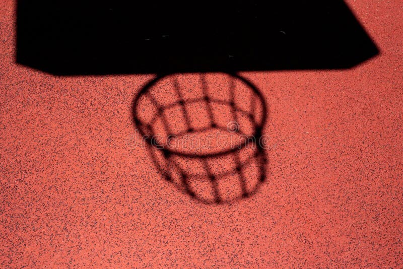 Shadow of a Basketball Hoop on a Red Ground Stock Image - Image of ...