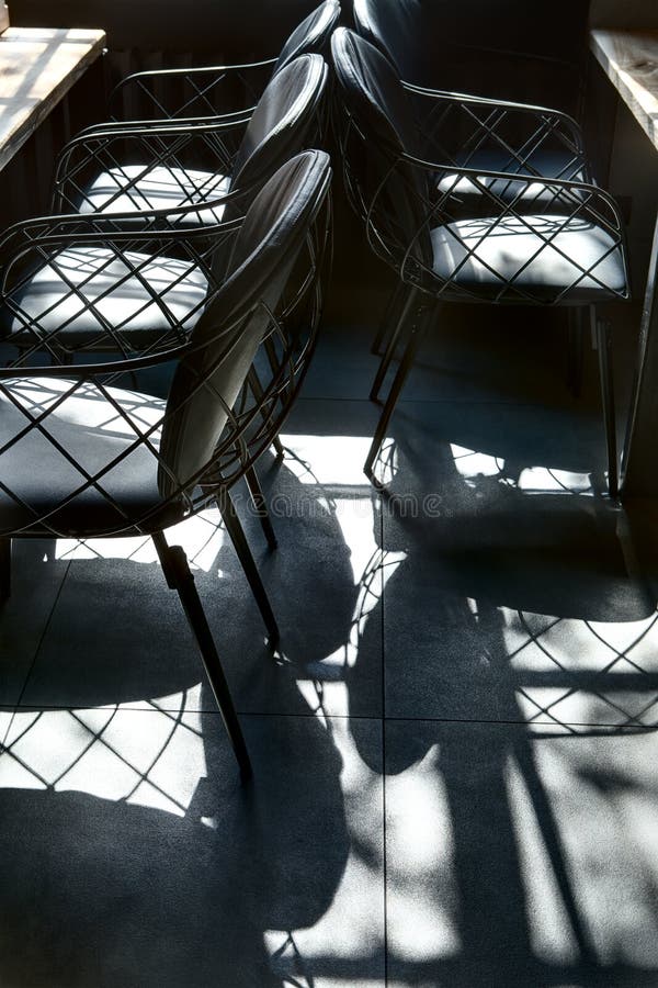 Shadow of Beautiful Chairs on the Floor Stock Image - Image of indoor ...