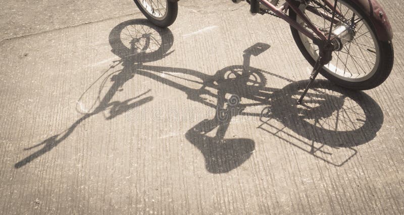 Shadow of bicycle stock photo. Image of sport, road, city - 81527294