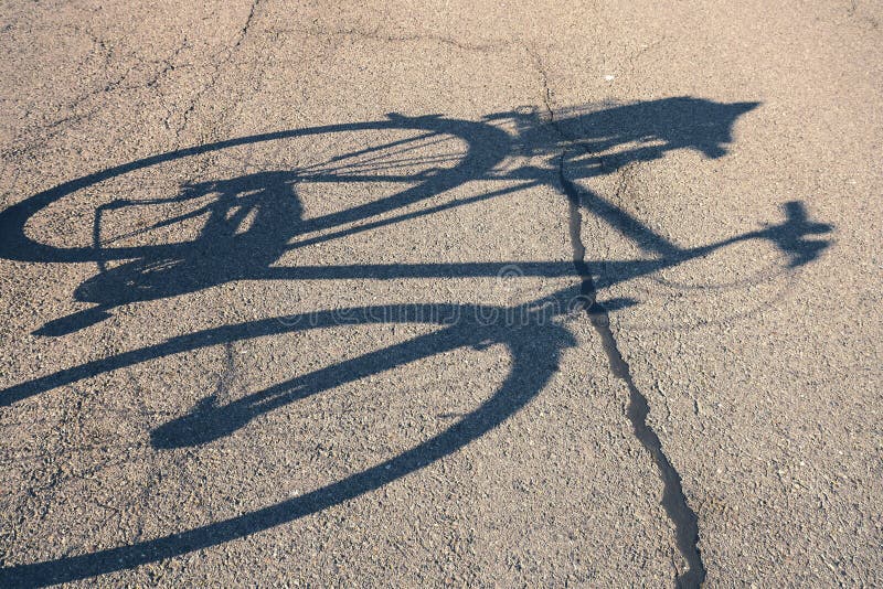 Shadow of a bicycle stock photo. Image of leisure, bike - 142928880