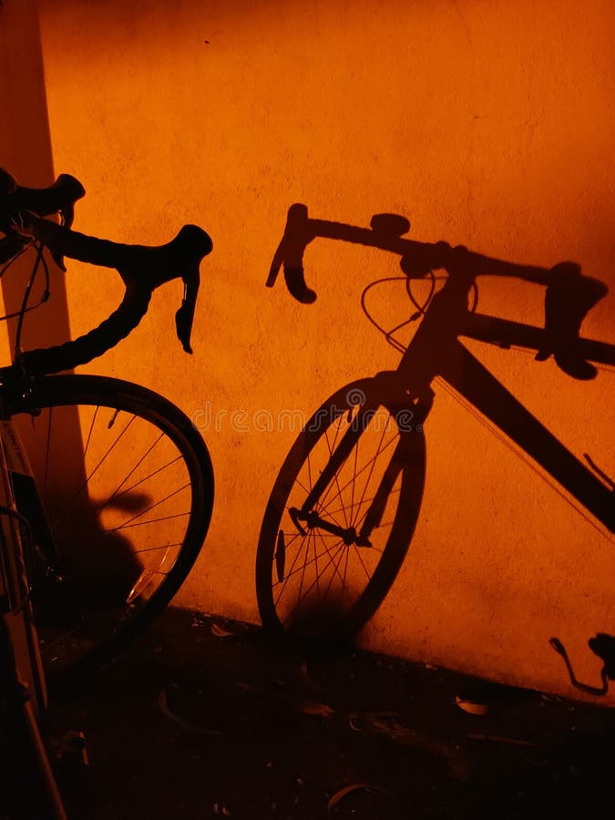 Shadow of a bike stock photo. Image of light, vehicle - 207621302