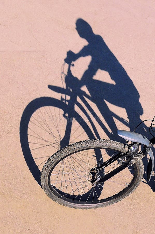 Shadow of the Bike and Biker Stock Photo - Image of reflection, biker ...