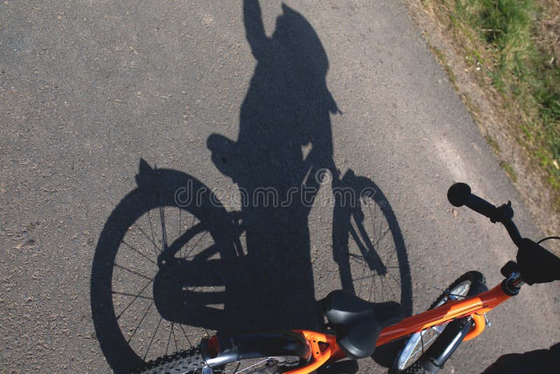 Shadow from the bike. stock image. Image of asphalt - 183323757