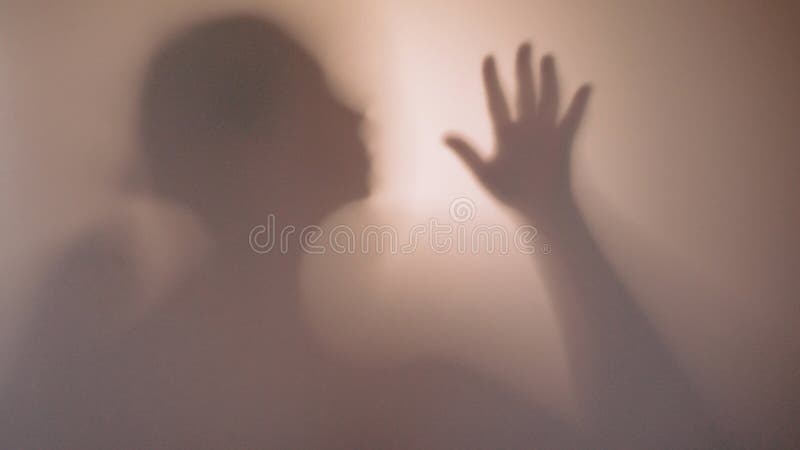 Shadow Blur Of A Horror Man Behind Frosted Glass Blurred Hand Body Shape Abstraction And One