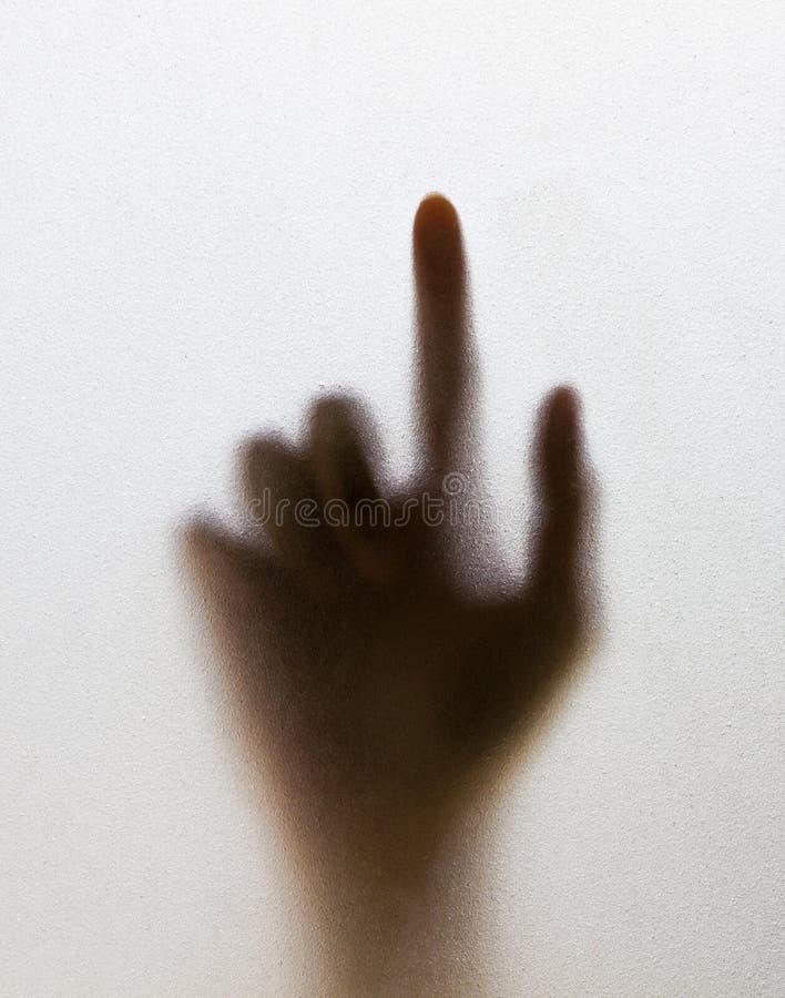 Shadow of a Blurry Hand Behind the Frosted Glass Stock Photo - Image of ...