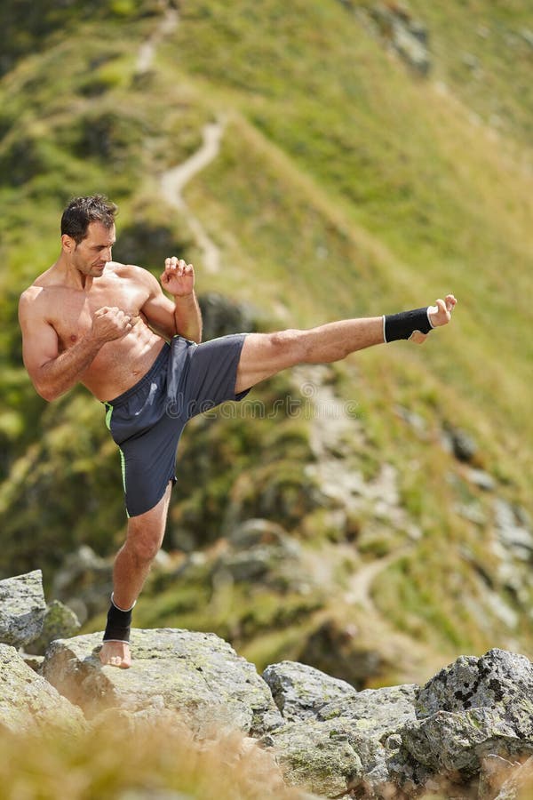 Shadow boxing on mountain stock image. Image of male - 59600239