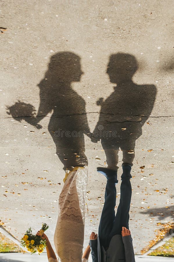 Shadow of Bride and Groom Holding Hands Outdoors, Happy Moment Stock ...