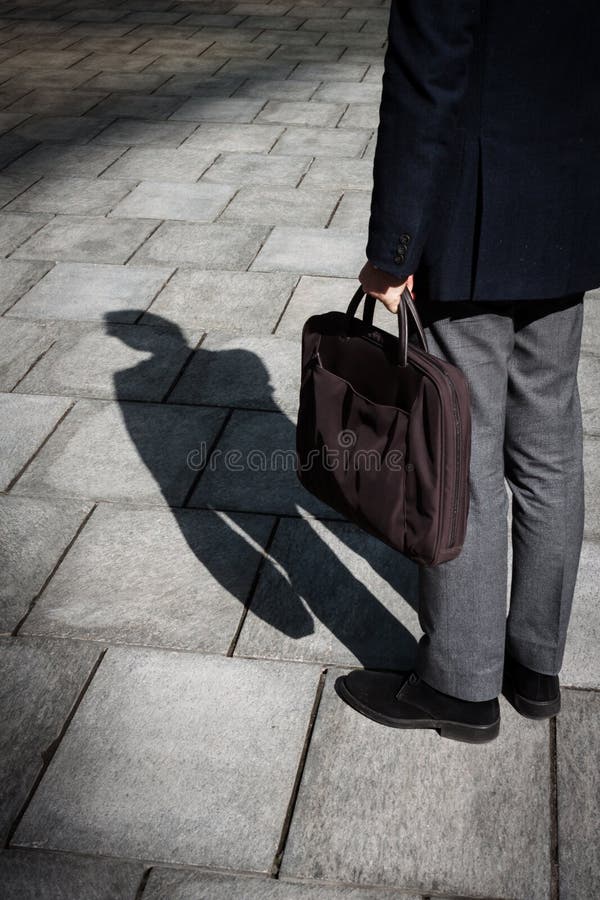 Shadow of a Businessman Standing Stock Image - Image of shape, person ...