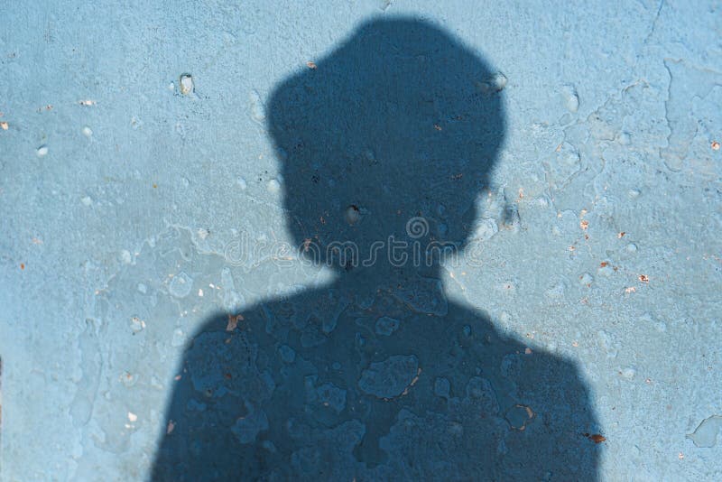 Shadow Cast on a Wall by an Unidentified Person Stock Photo - Image of ...