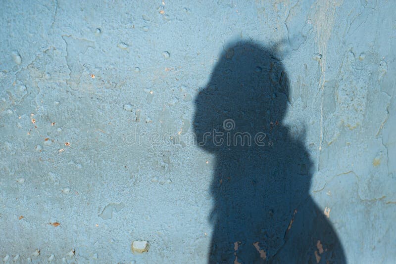 Shadow Cast on a Wall by an Unidentified Person Stock Image - Image of ...