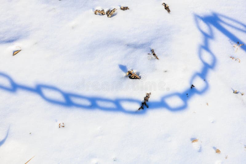 Shadow of a Chain on the Snow. Background with Selective Focus and Copy ...