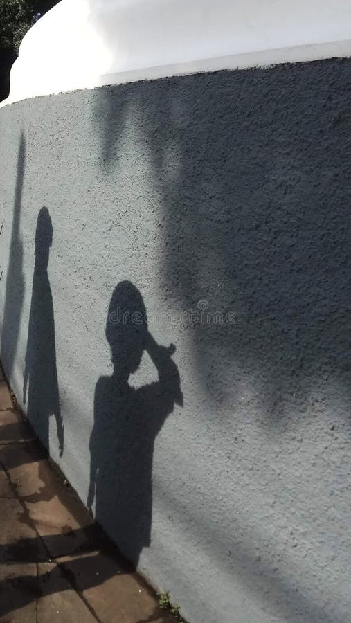 The Shadow of the Child Playing Outside Stock Photo - Image of street ...