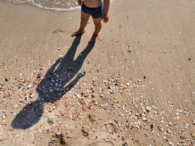 A Shadow of a Child Standing in Front of a Facade Stock Image - Image ...