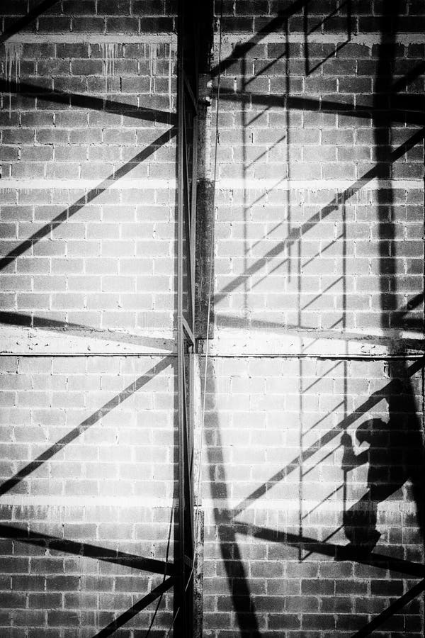 Shadow of Climbing ladders stock photo. Image of facade - 84199426