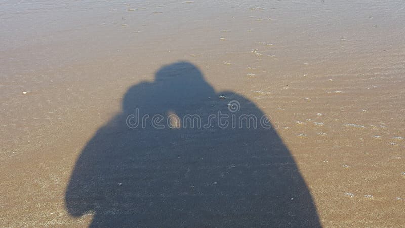 Shadow of a Couple Holding Hands on Grass Stock Image - Image of walk ...