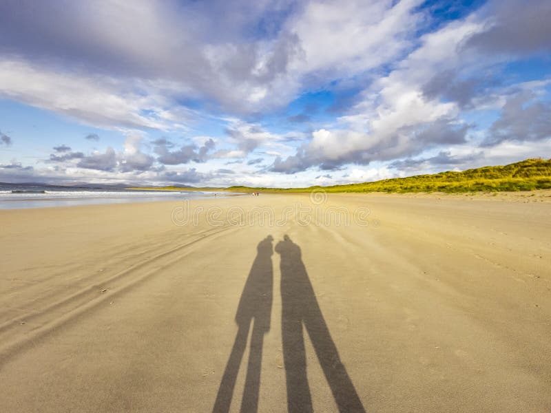 Shadow of Couple Enjoying the Beach Stock Photo - Image of sunset ...