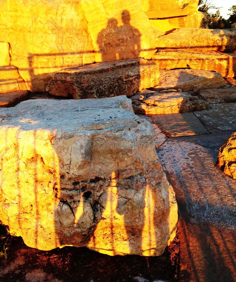 A Shadow of a Couple on the Rock Stock Image - Image of traveling, love ...