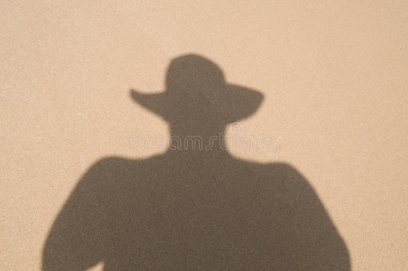 Shadow of cowboy in hat stock photo. Image of grains - 22091770
