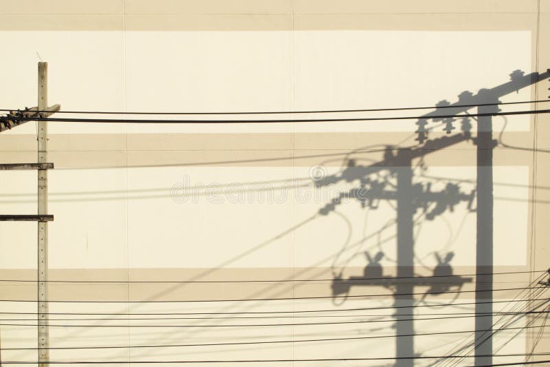 The Shadow of the Electric Pole in the Background of the Sun Stock ...