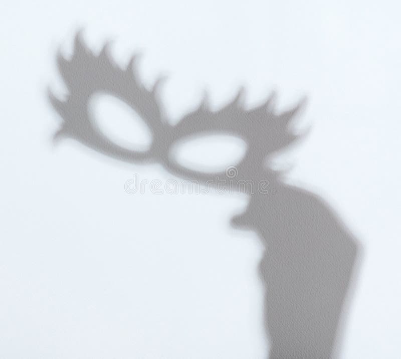 Shadow of Face Mask in Hand Stock Photo - Image of shades, overlay ...