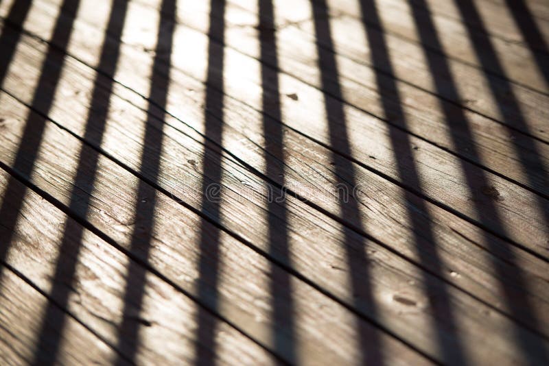 The Shadow of the Fence on the Old Wood Stock Image - Image of ...