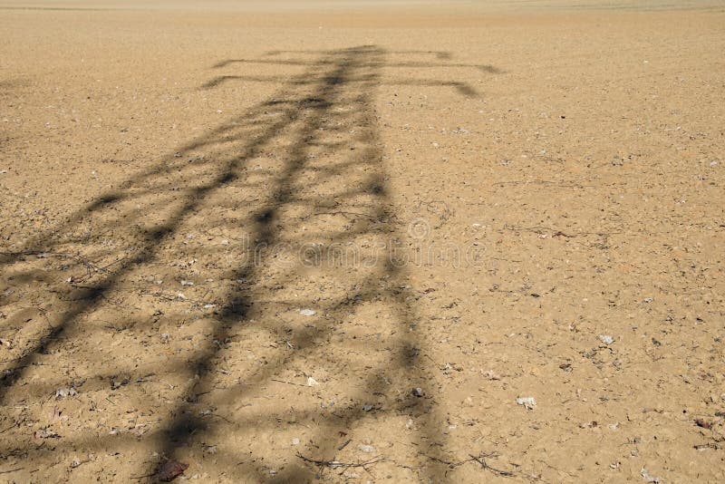 Shadow on the field stock photo. Image of pole, stone - 51238972