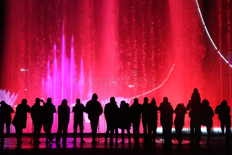 Shadow Figures of People Watching the Fountain Show Stock Photo - Image ...