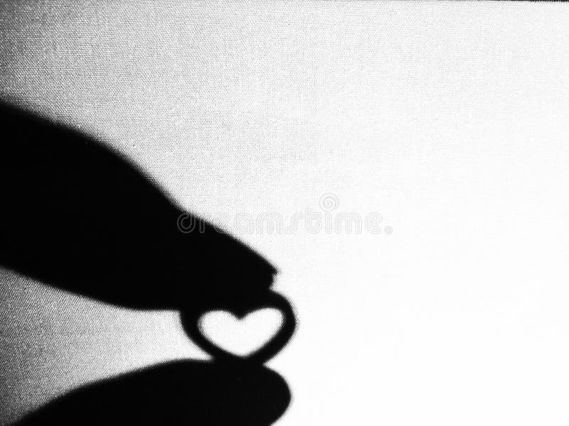 Shadow of finger and heart stock photo. Image of heart - 49726220