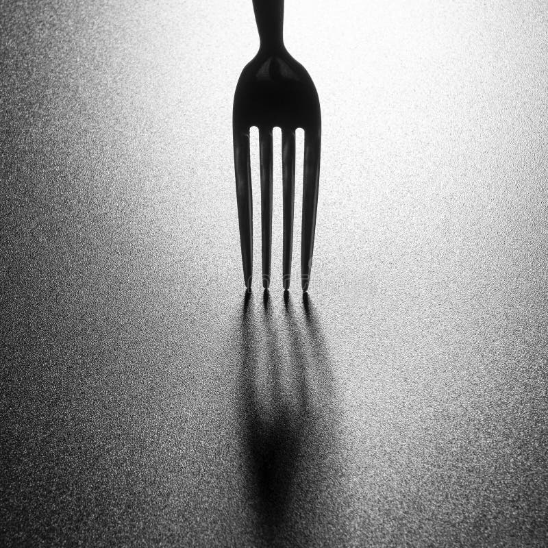 A shadow of the fork stock photo. Image of light, close - 159514644